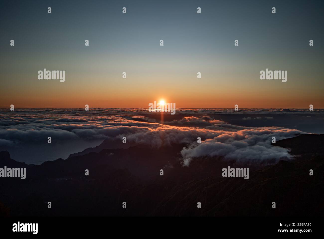 Stunning Sunrise Over the Clouds – Pico do Arieiro, Madeira Stock Photo ...