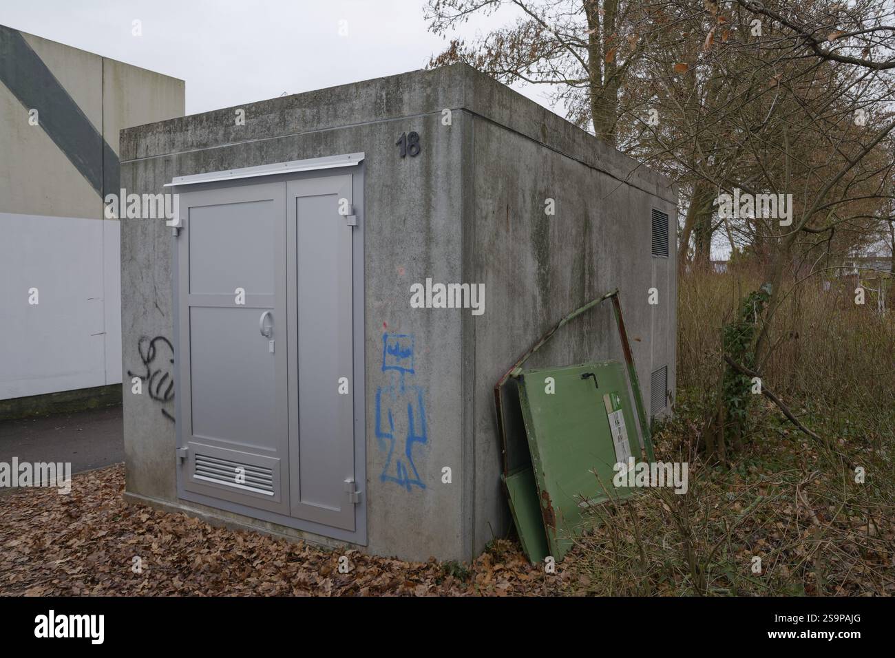 Replacing the door on a transformer station, substation, grid station ...