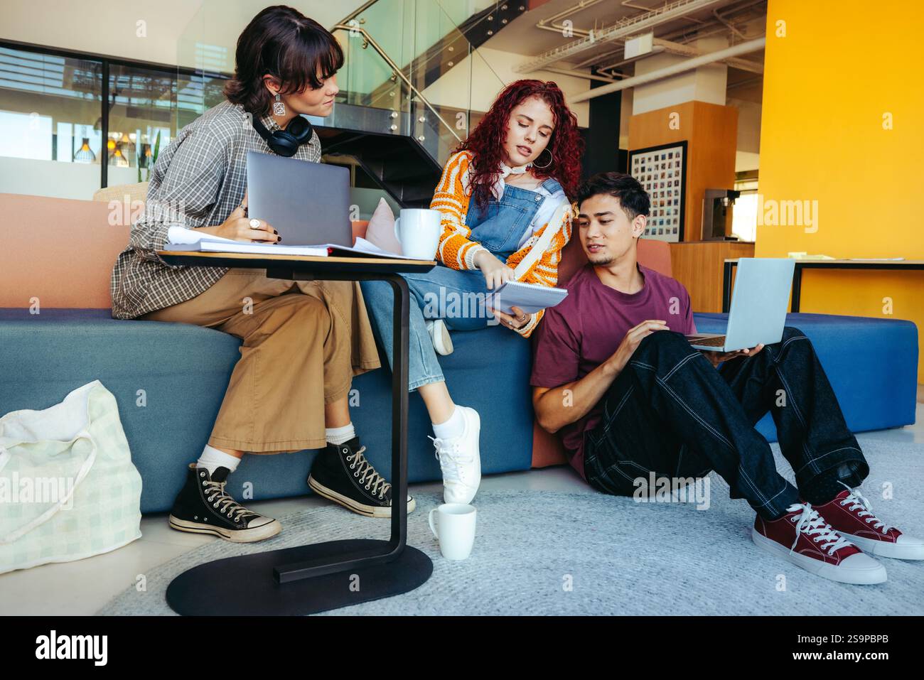 Friends working together on an undergrad project, showcasing ...