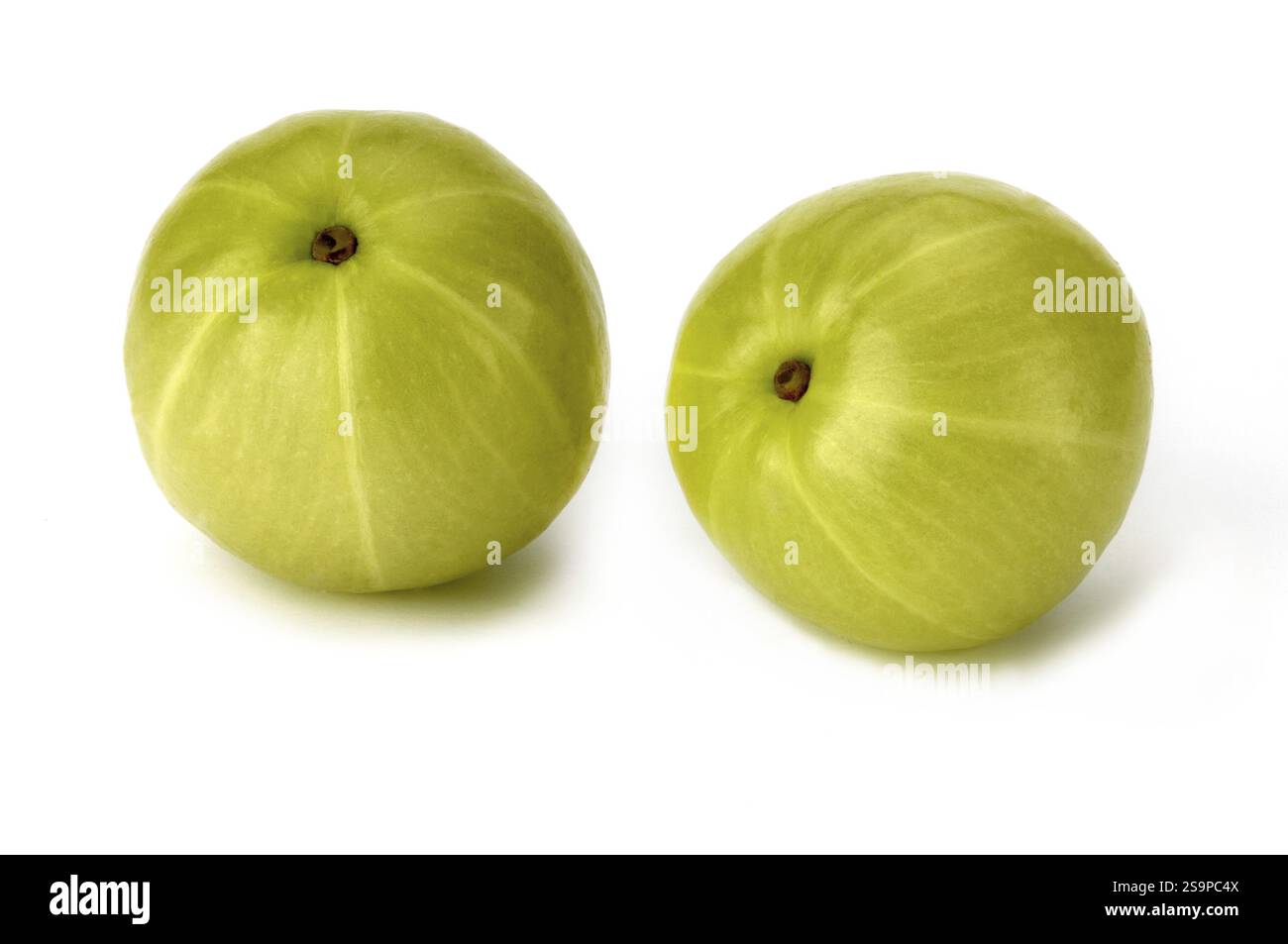 Fruits, Two Emblic gooseberries on a white background Stock Photo - Alamy