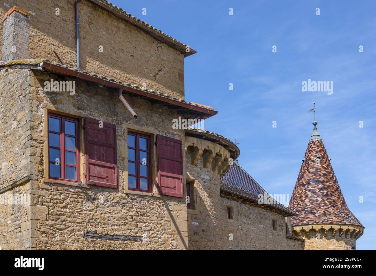 Details of window, towers, and glaced roof tiles of the medieval ...