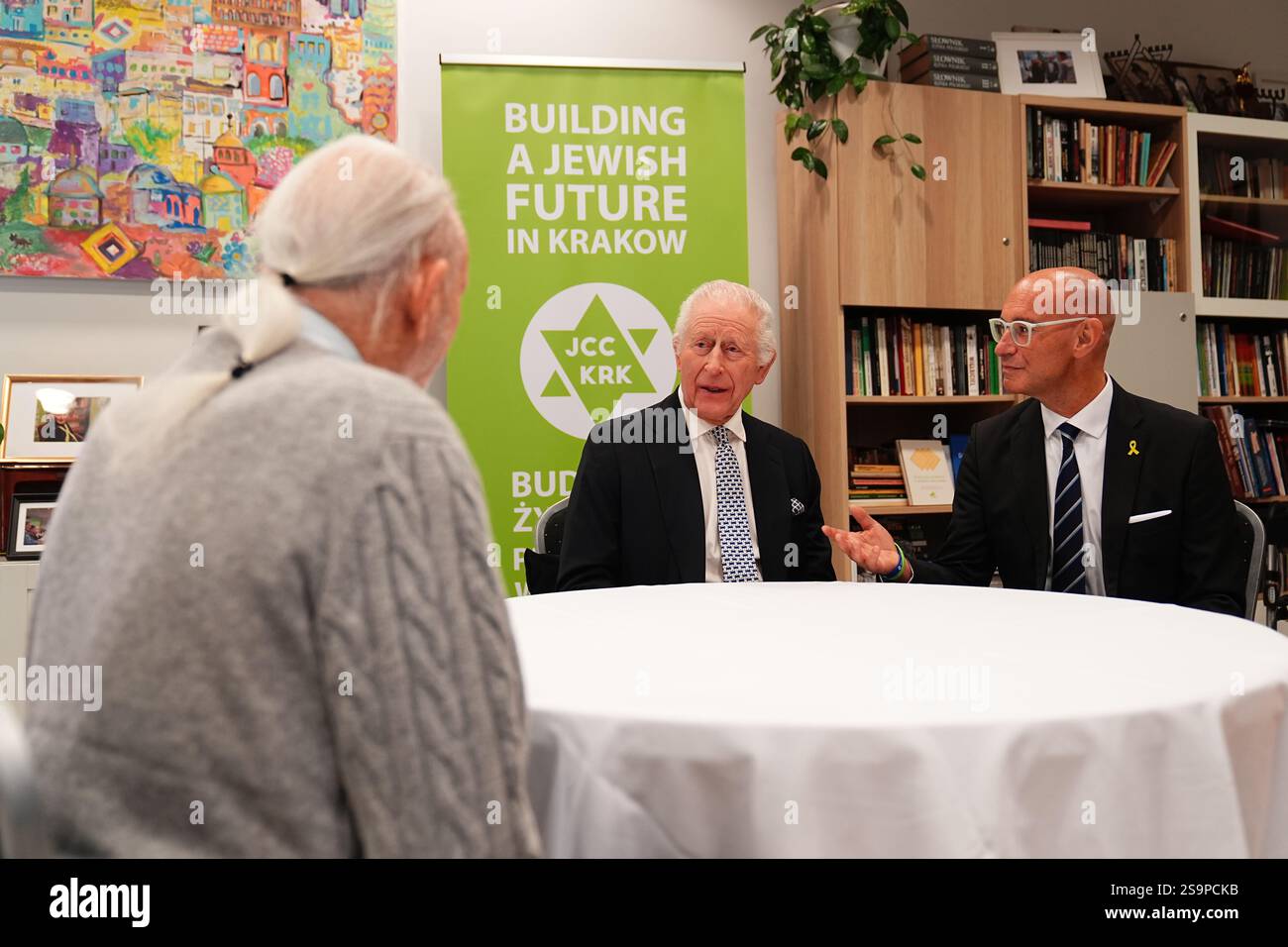 King Charles III speaks with Holocaust survivors (left) and with JCC ...