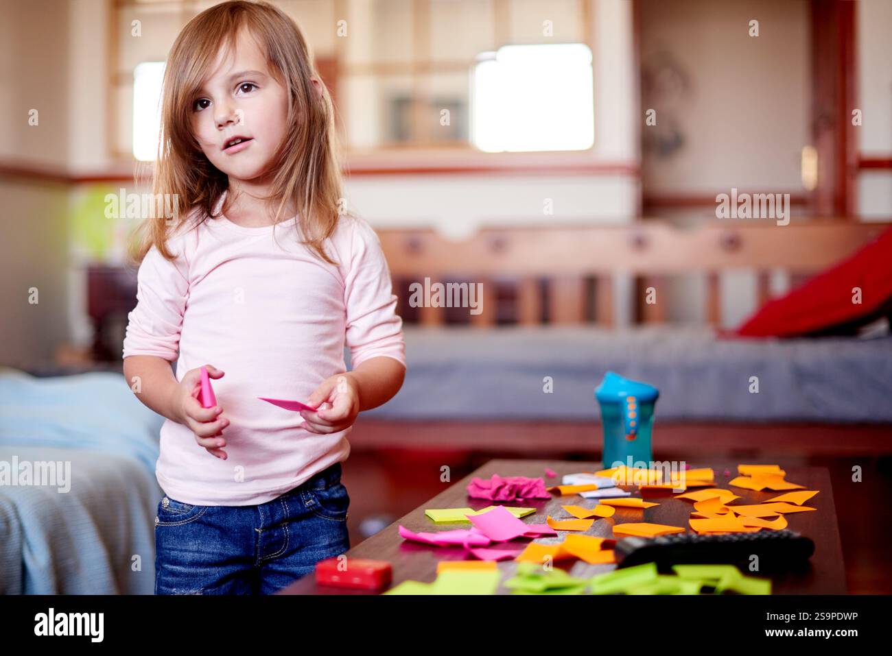 Home, creative and girl child with mess for remote learning, education ...