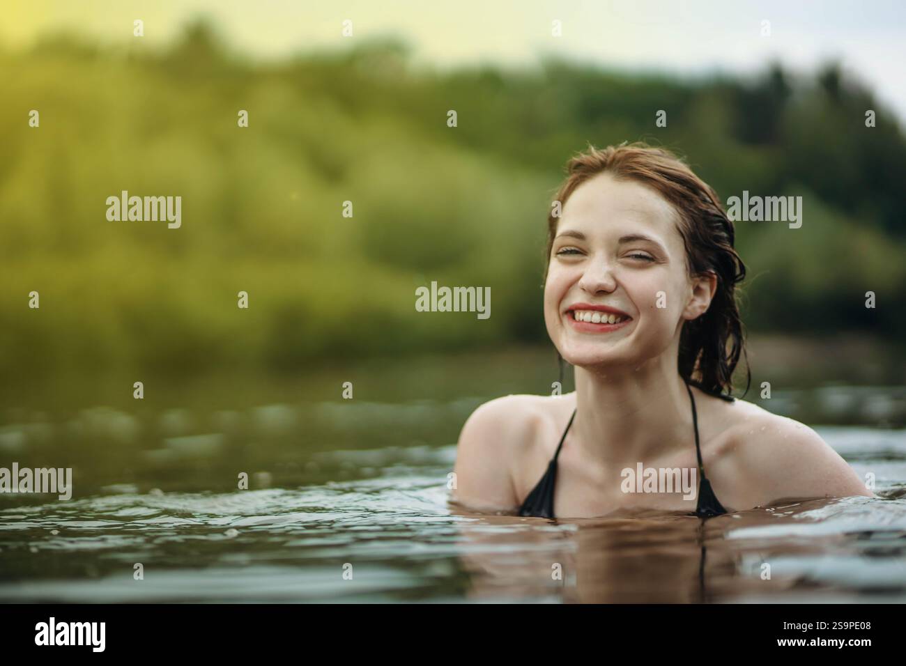 Woman joyfully floating in hi-res stock photography and images - Alamy