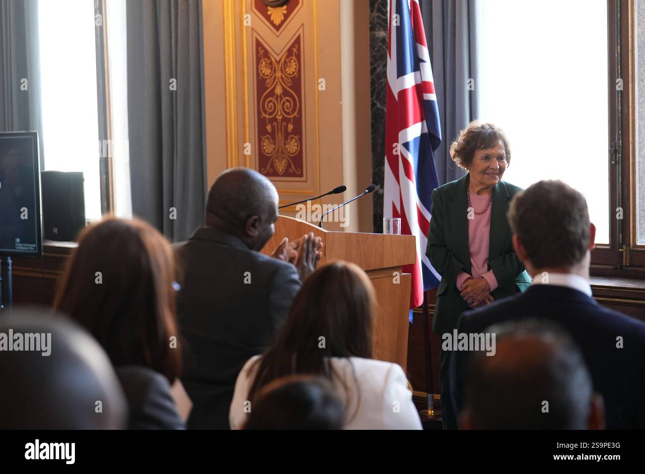 Holocaust survivor Janine Webber speaking during an event at the ...