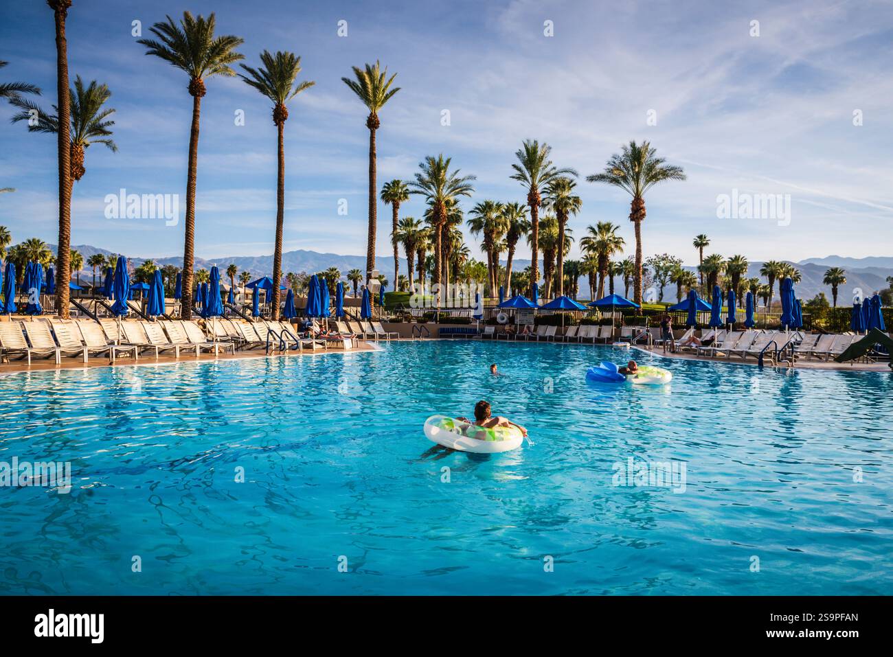 Palm Desert, CA USA - May 6, 2018: Children floating in resort pool at ...