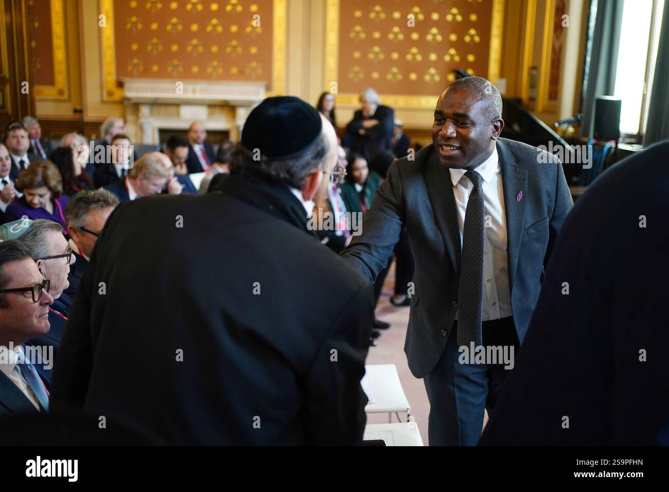 Foreign Secretary David Lammy (right) meeting a member of the Jewish ...