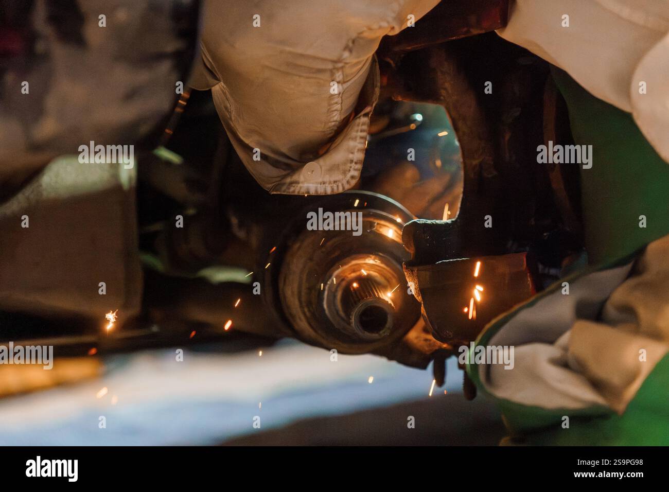 Detail-Oriented Mechanic Performing Precision Welding on Automotive ...