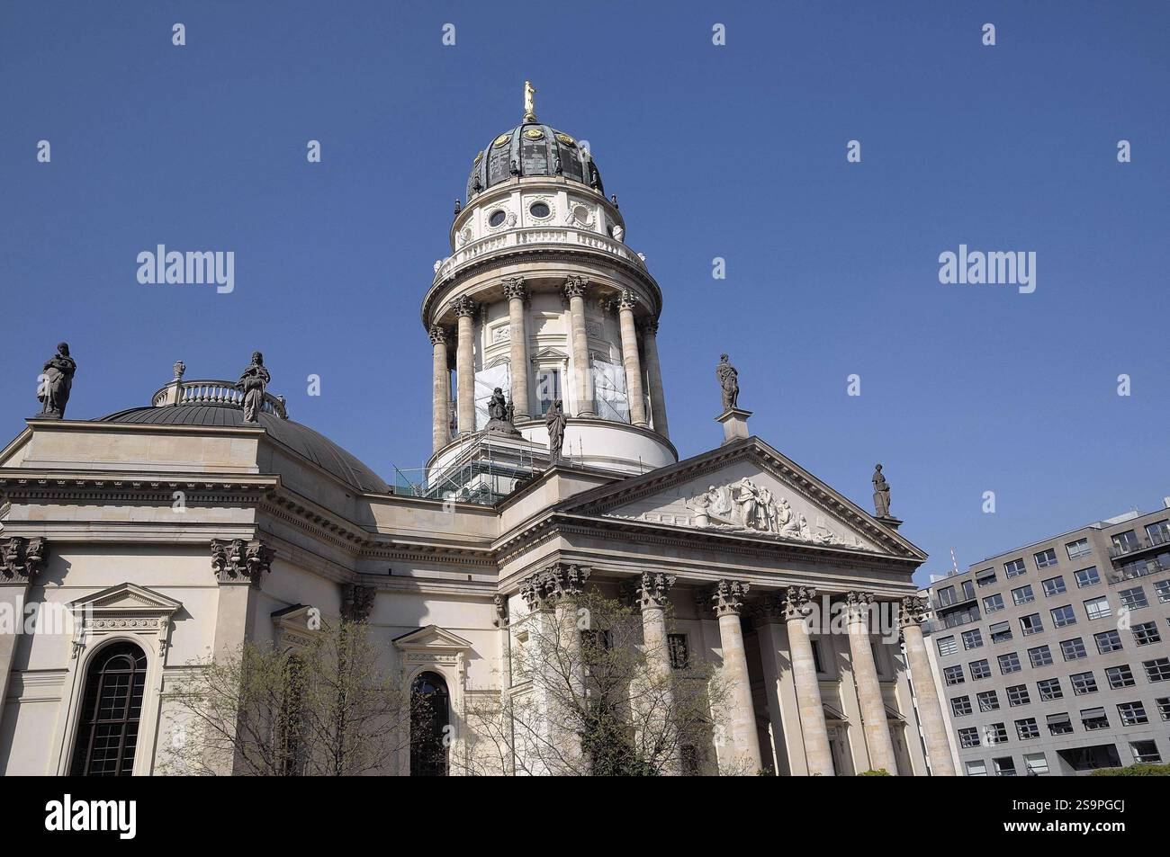 Front view of a historic neoclassical building with a dominant ...