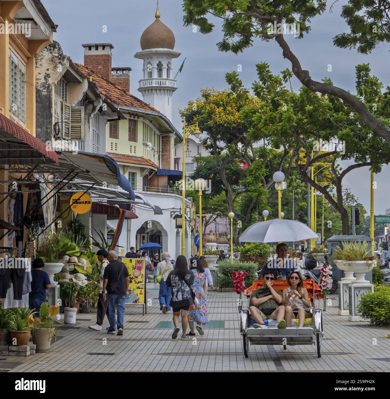 Tourists in rickshaw, old town of George Town, Georgetown, Penang ...