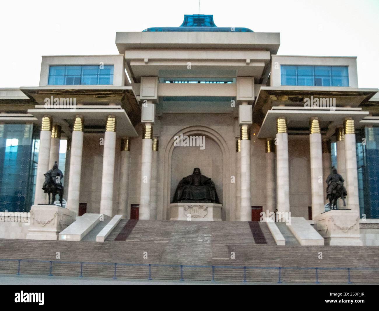 A large building with statues of men on horseback and a statue of a man ...