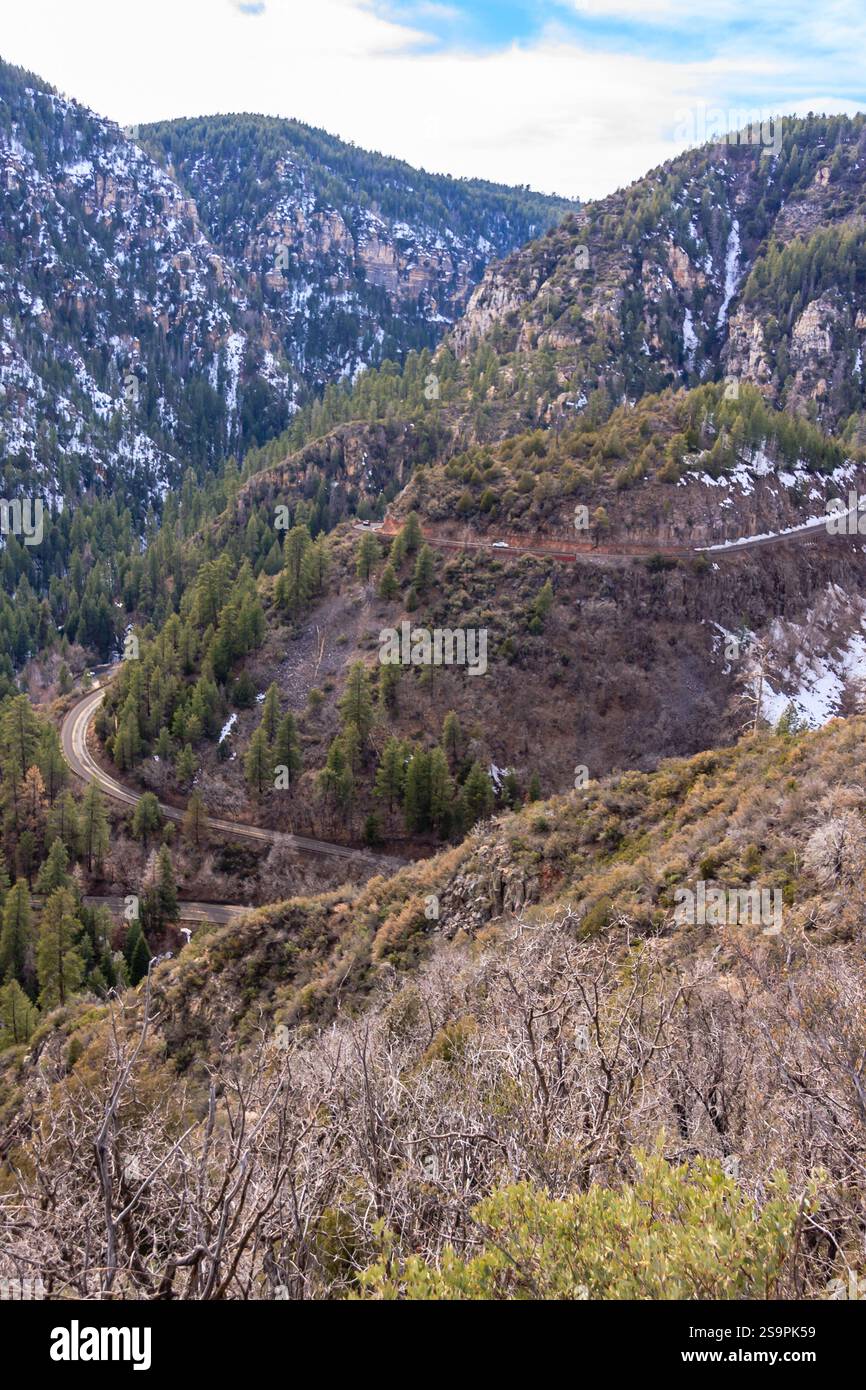 Snow covered road in mountain gorge hi-res stock photography and images ...