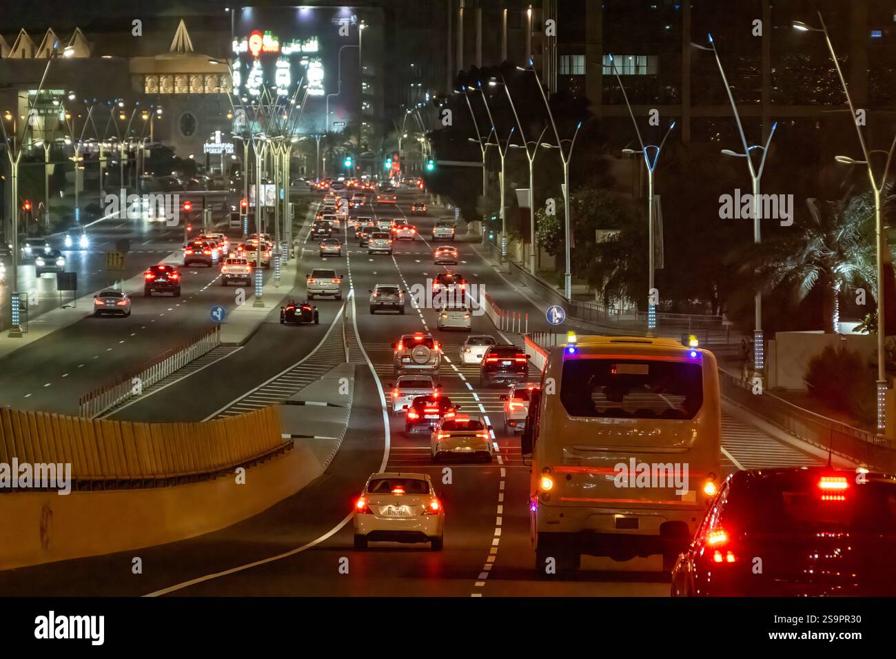 Night view of west bay Doha Qatar. Doha Roads and traffic Stock Photo ...