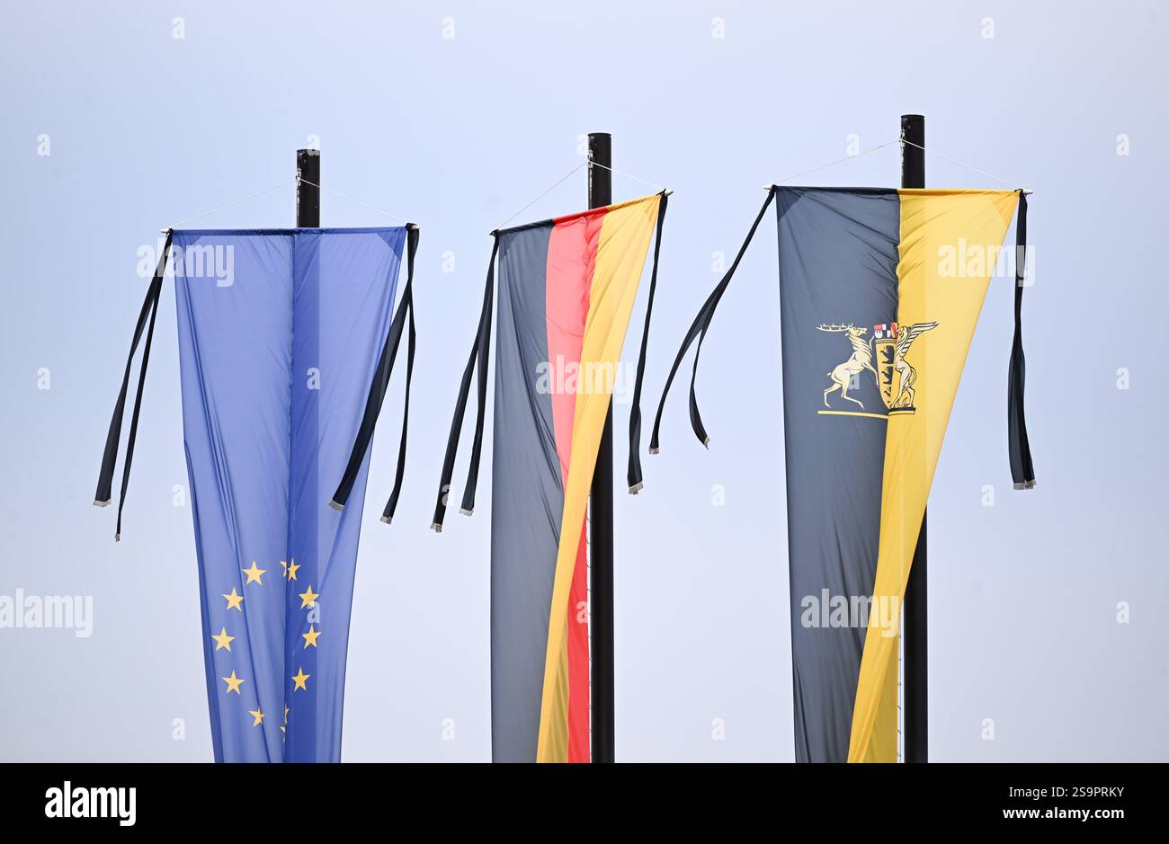 27 January 2025, Baden-Württemberg, Stuttgart: Flags of Europe, Germany ...