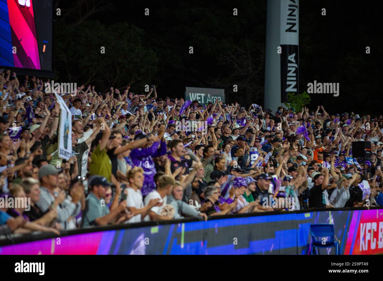 Hobart, Australia. 27th Jan, 2025. Fans at Ninja Stadium celebrate the ...