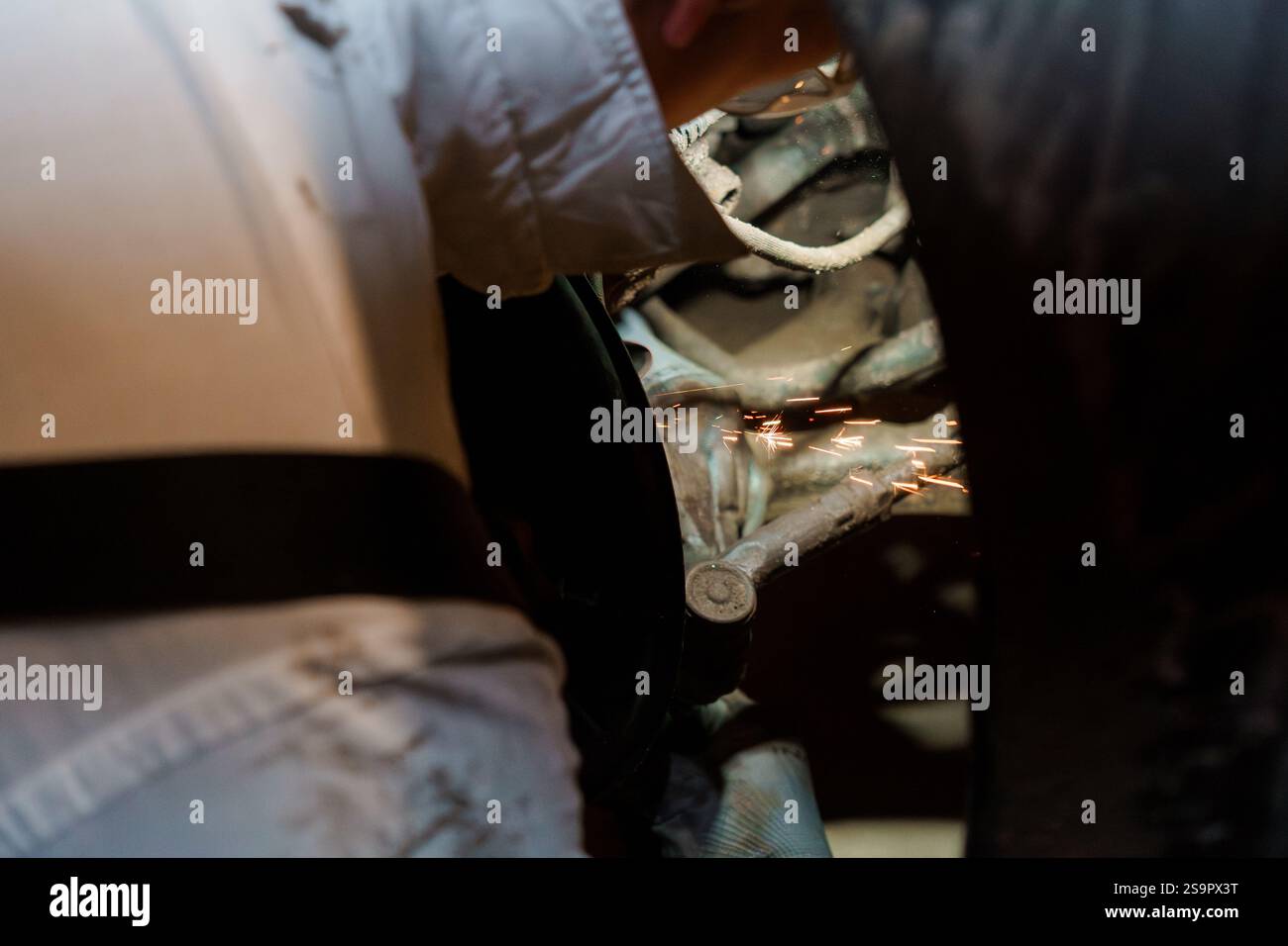 A Mechanic Performing Precision Welding on Automotive Components Stock ...