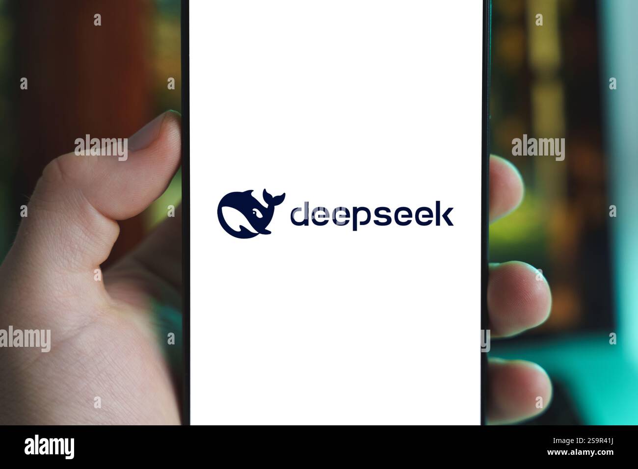 A smartphone displaying the Deepseek logo, a prominent Chinese AI ...