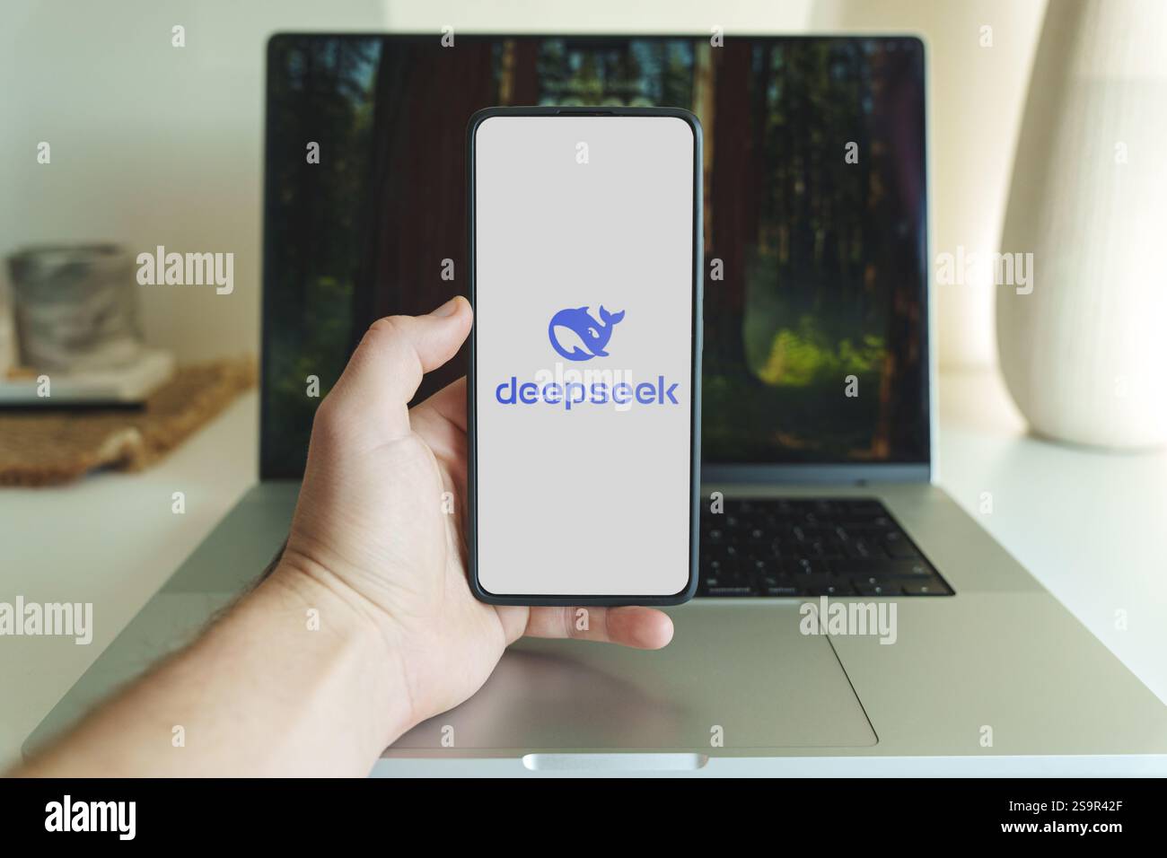 A smartphone displaying the Deepseek logo, a prominent Chinese AI ...