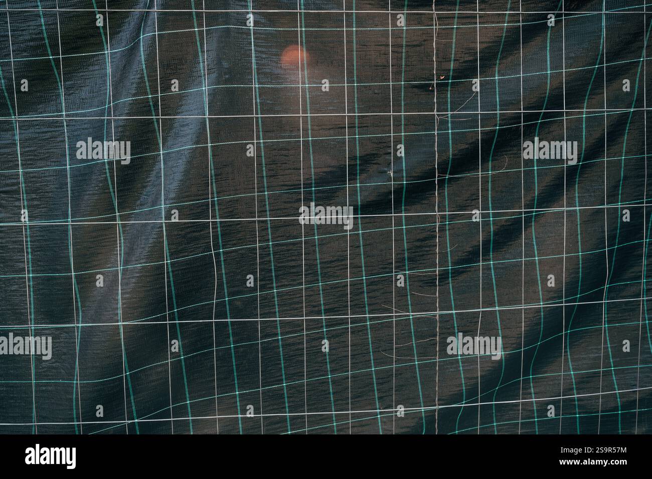 Temporary shade cloth fencing material texture as background Stock ...