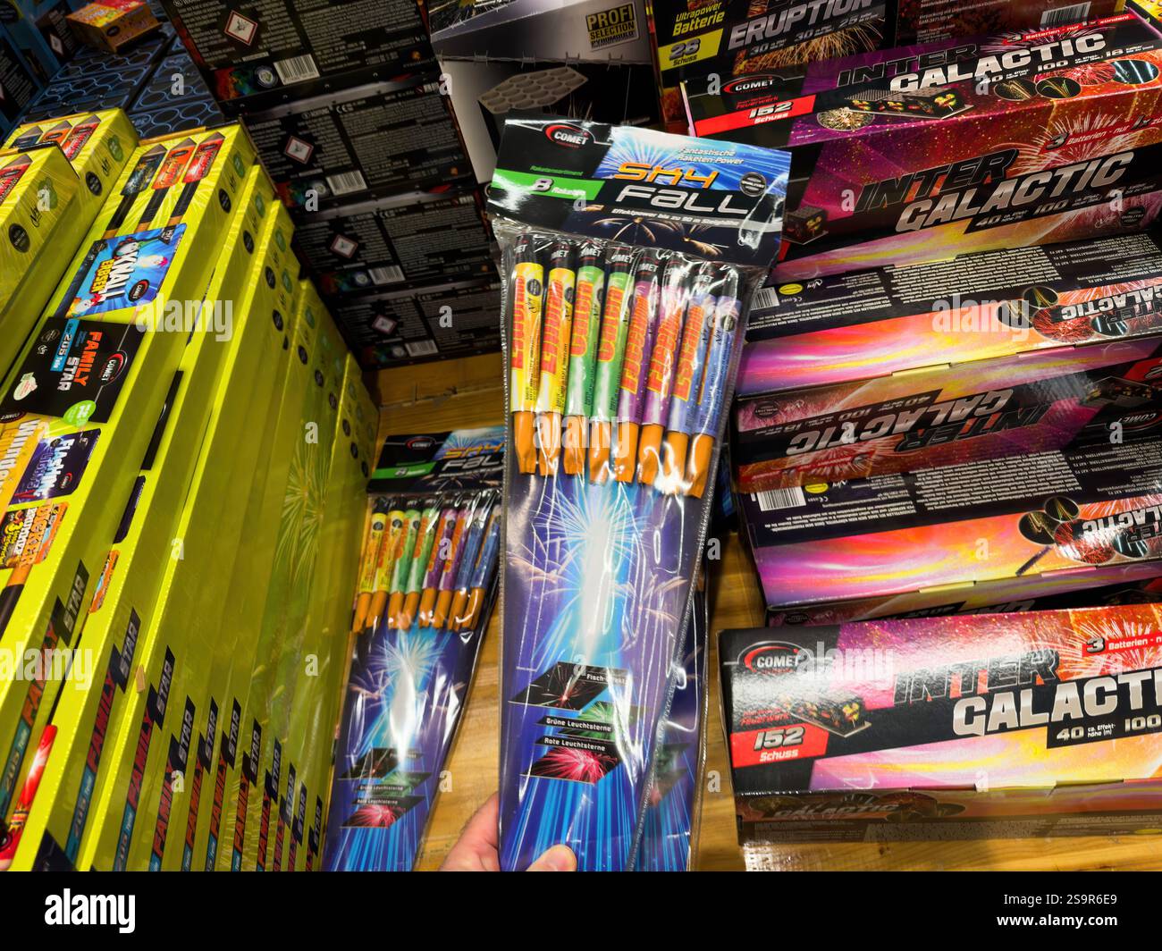 Frankfurt, Germany - Dec 30, 2024: A store display showcasing various fireworks packages ...