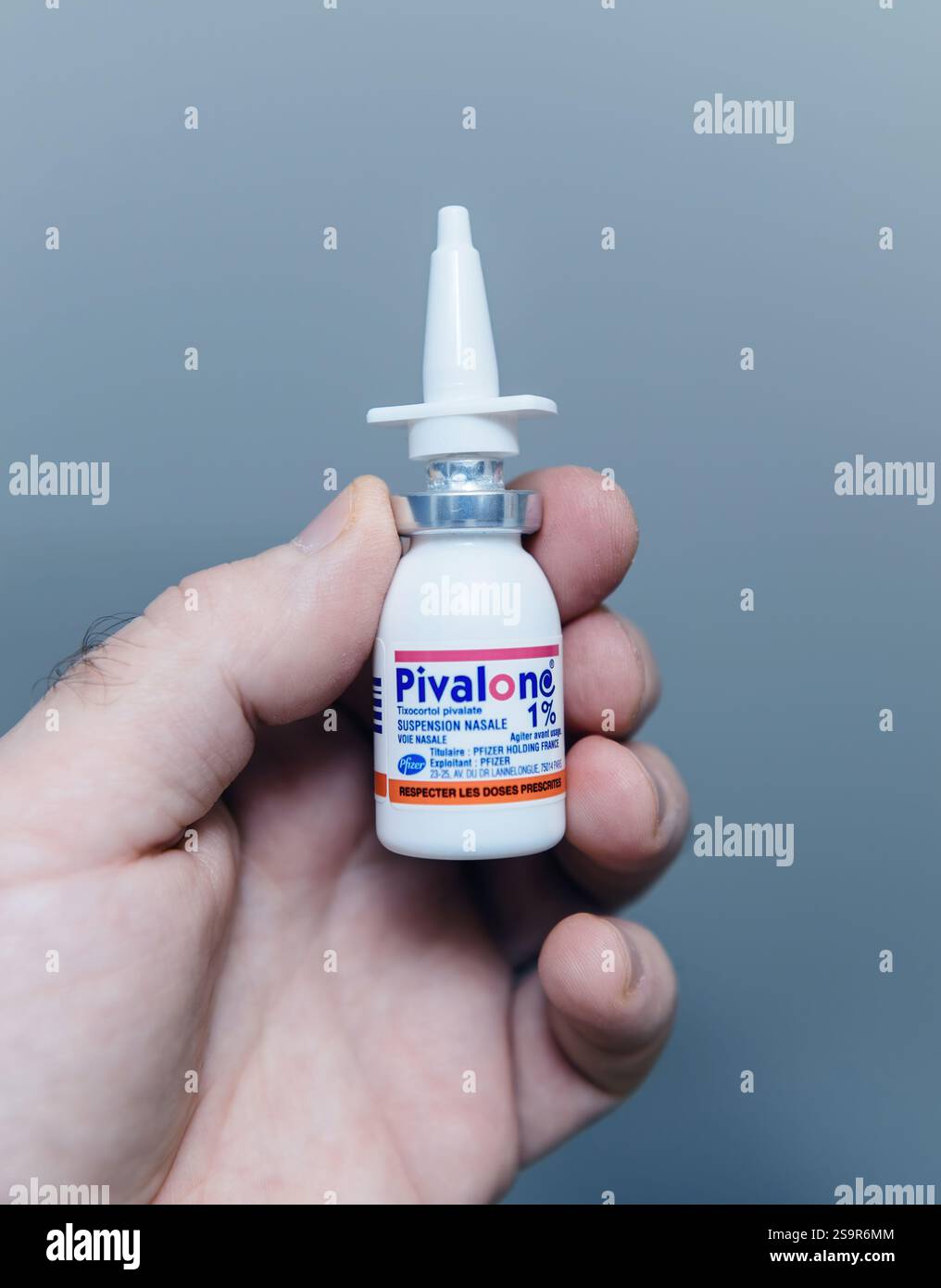 Paris, France - Jan 18, 2025: A hand holding a Pivalone 1 percent nasal ...