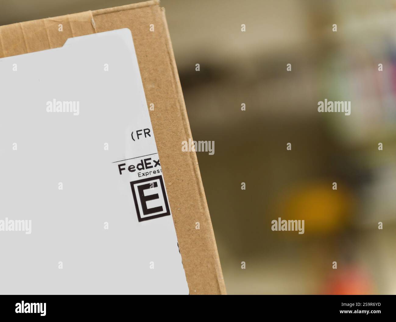 Paris, France - Jan 21, 2025: A detailed close-up of a FedEx cardboard ...