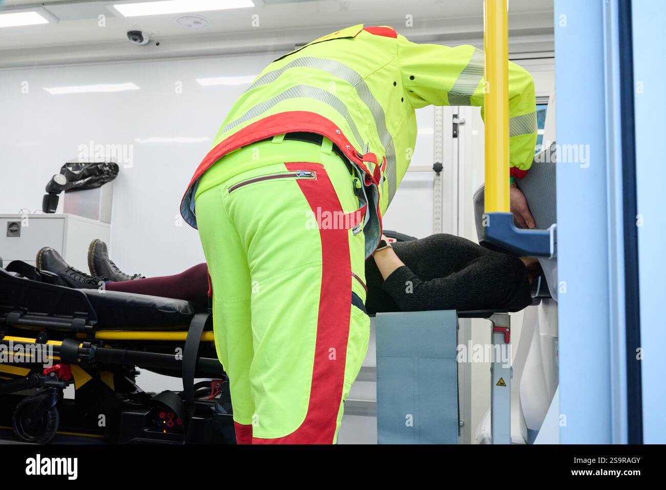 27 January 2025, Berlin: A woman lies in a CT scanner in a vehicle ...
