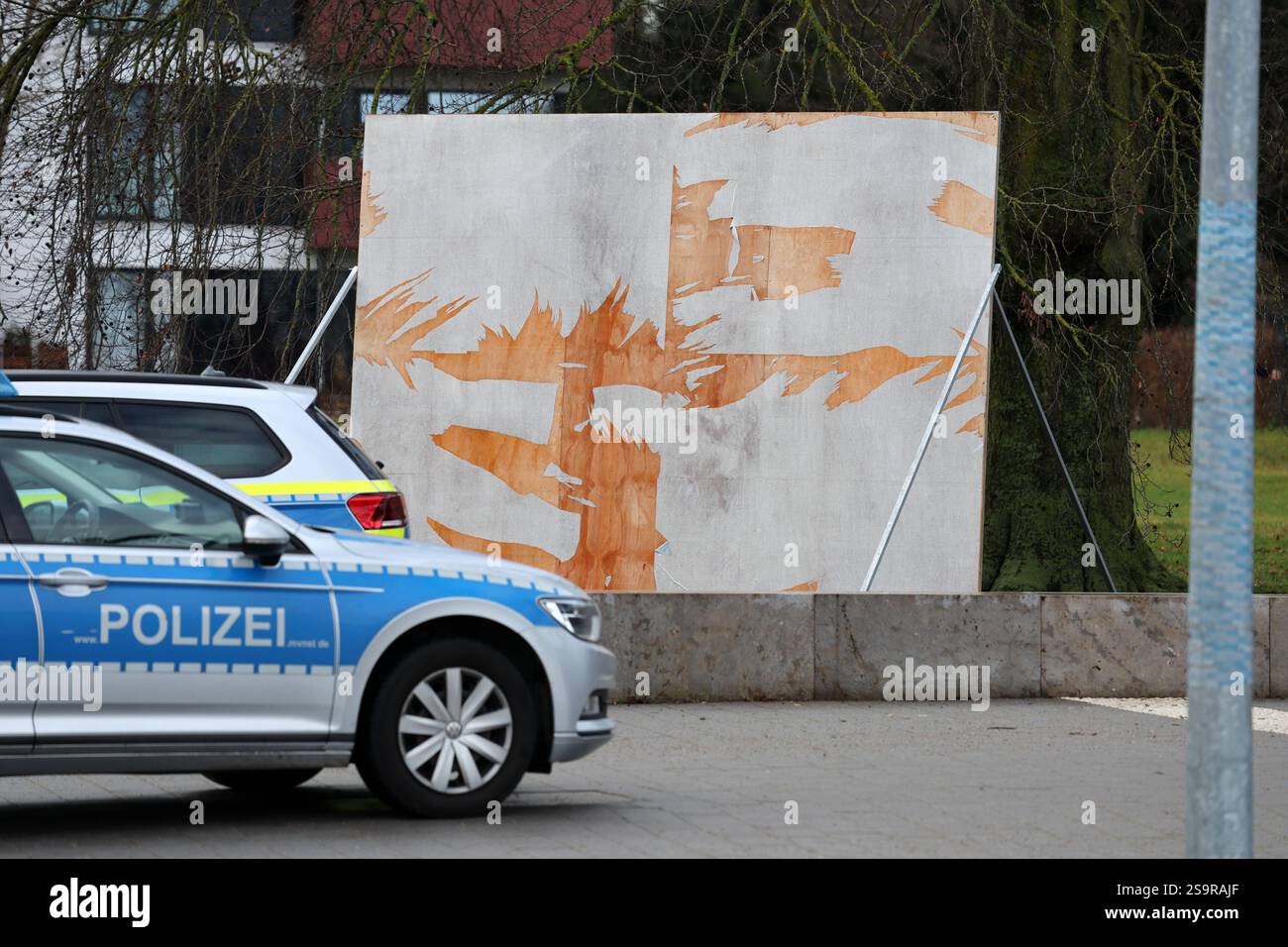 Rostock, Germany. 27th Jan, 2025. A police car stands in front of a ...