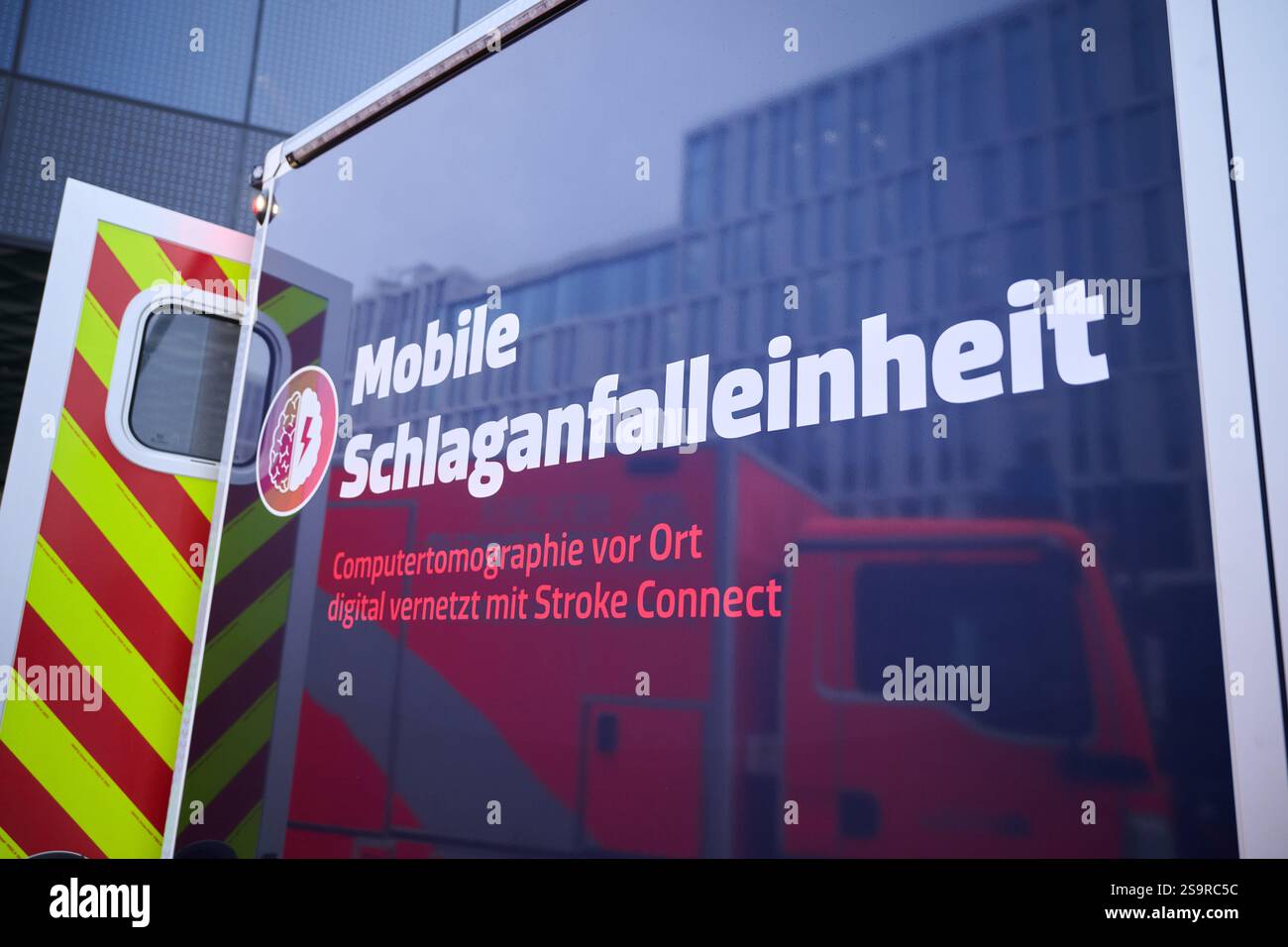 Berlin, Germany. 27th Jan, 2025. An emergency vehicle reads "Mobile ...