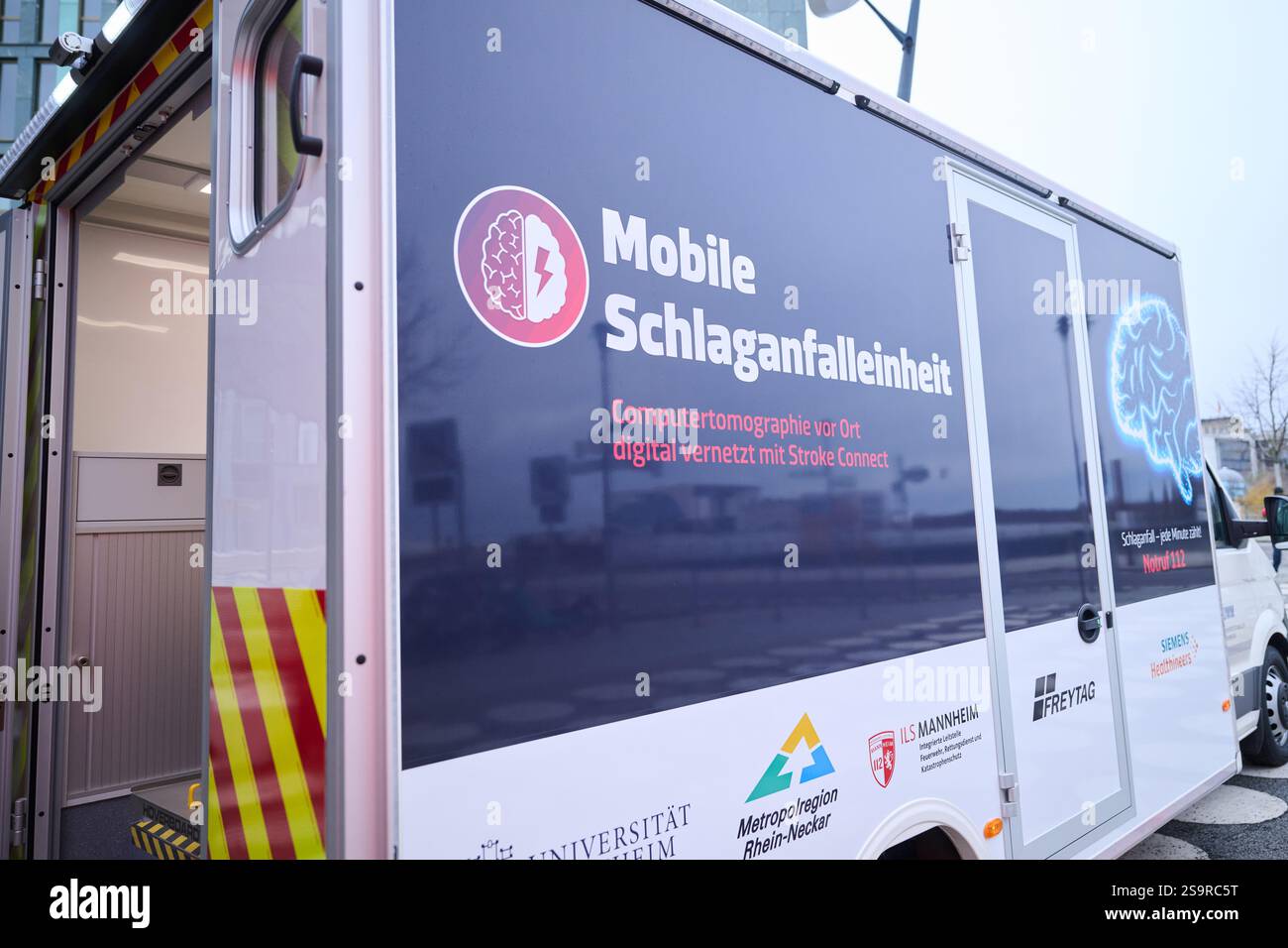 Berlin, Germany. 27th Jan, 2025. An emergency vehicle reads "Mobile ...