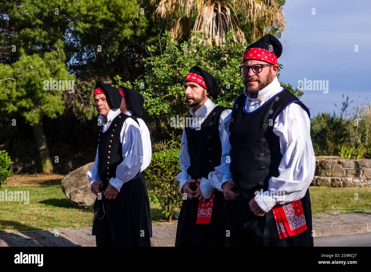 A group of traditionally dressed men taking part in the Madonna di ...