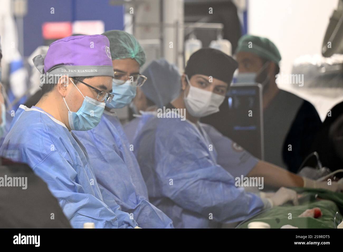 Rawalpindi. 23rd Jan, 2025. Chinese doctor Pan Xiangbin (1st L ...