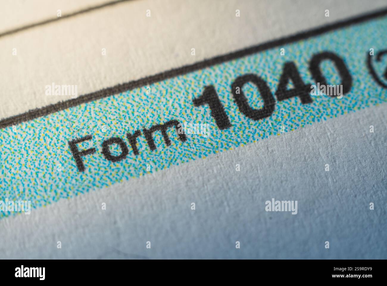Federal income tax return preparation with 1040 form and calculator for ...