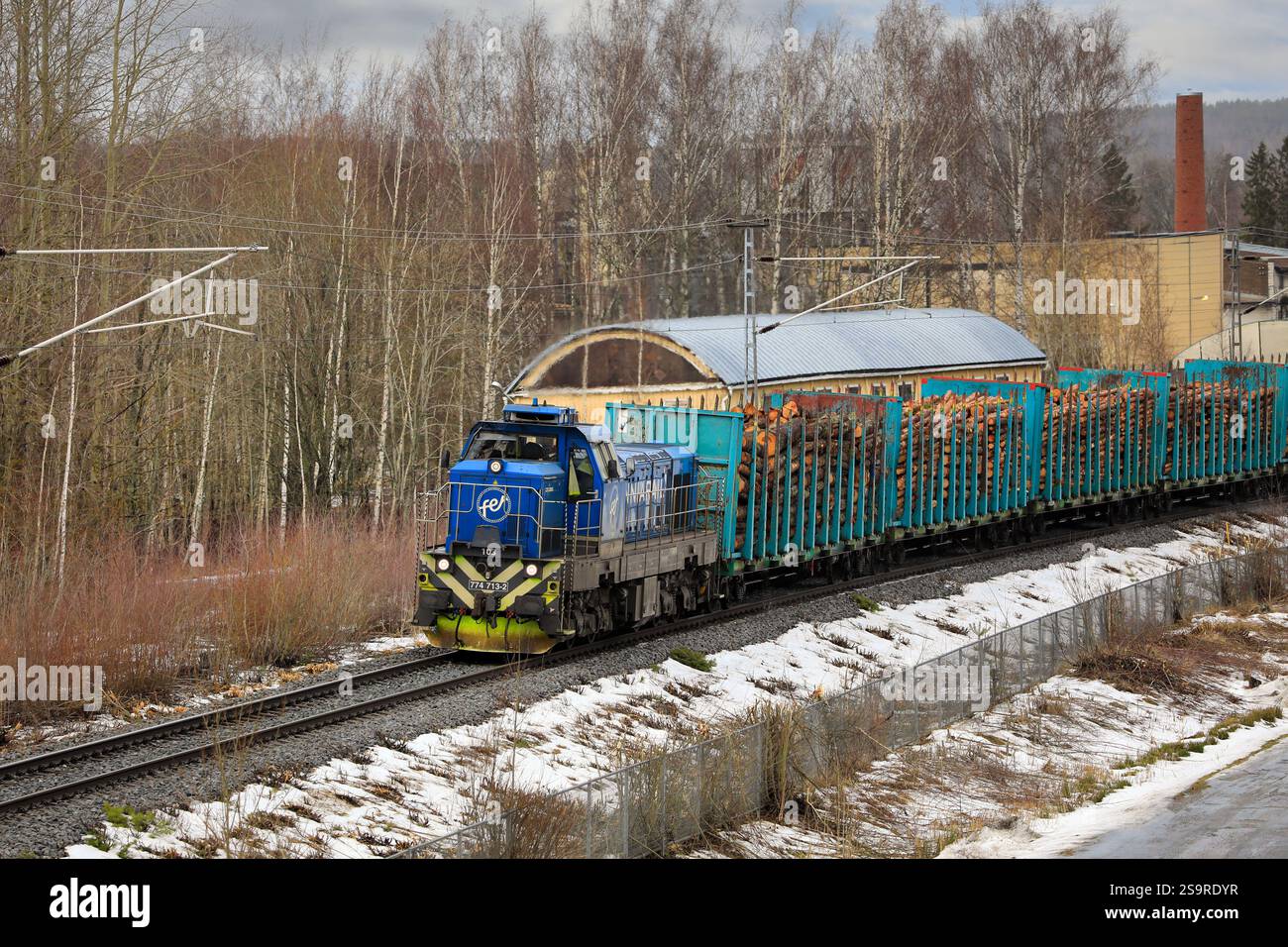 Fenniarail Class Dr18 No. 103 locomotive pulling a long freight train ...