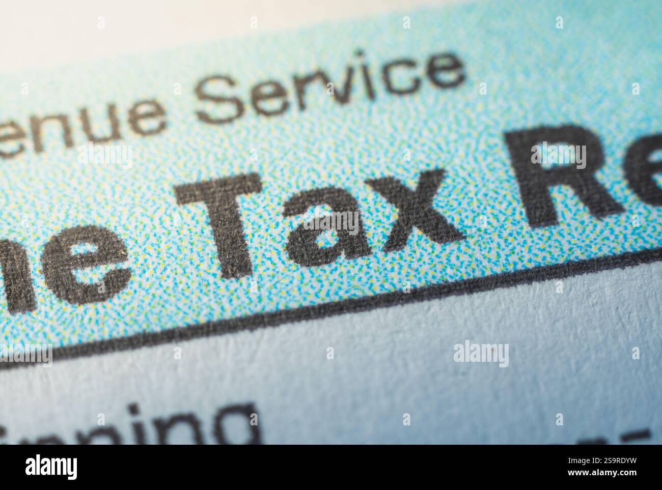 Federal income tax return preparation with 1040 form and calculator for ...