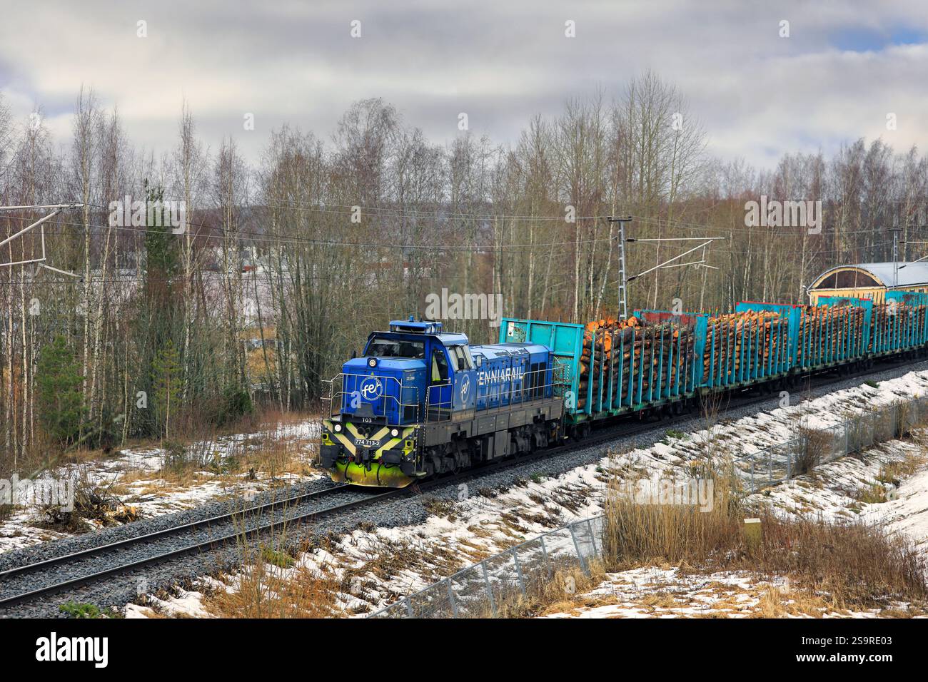 Fenniarail Class Dr18 No. 103 locomotive pulling a long freight train ...
