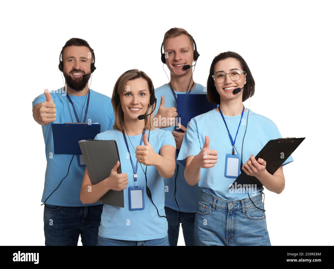 Technical support call center. Team of friendly operators showing ...