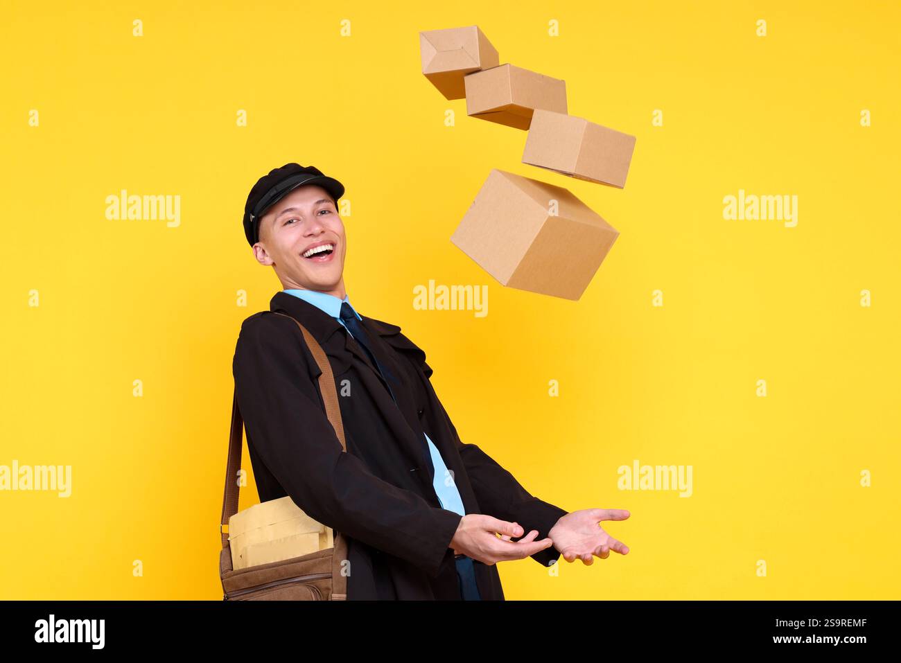 Happy postman with bag throwing parcels on yellow background Stock ...