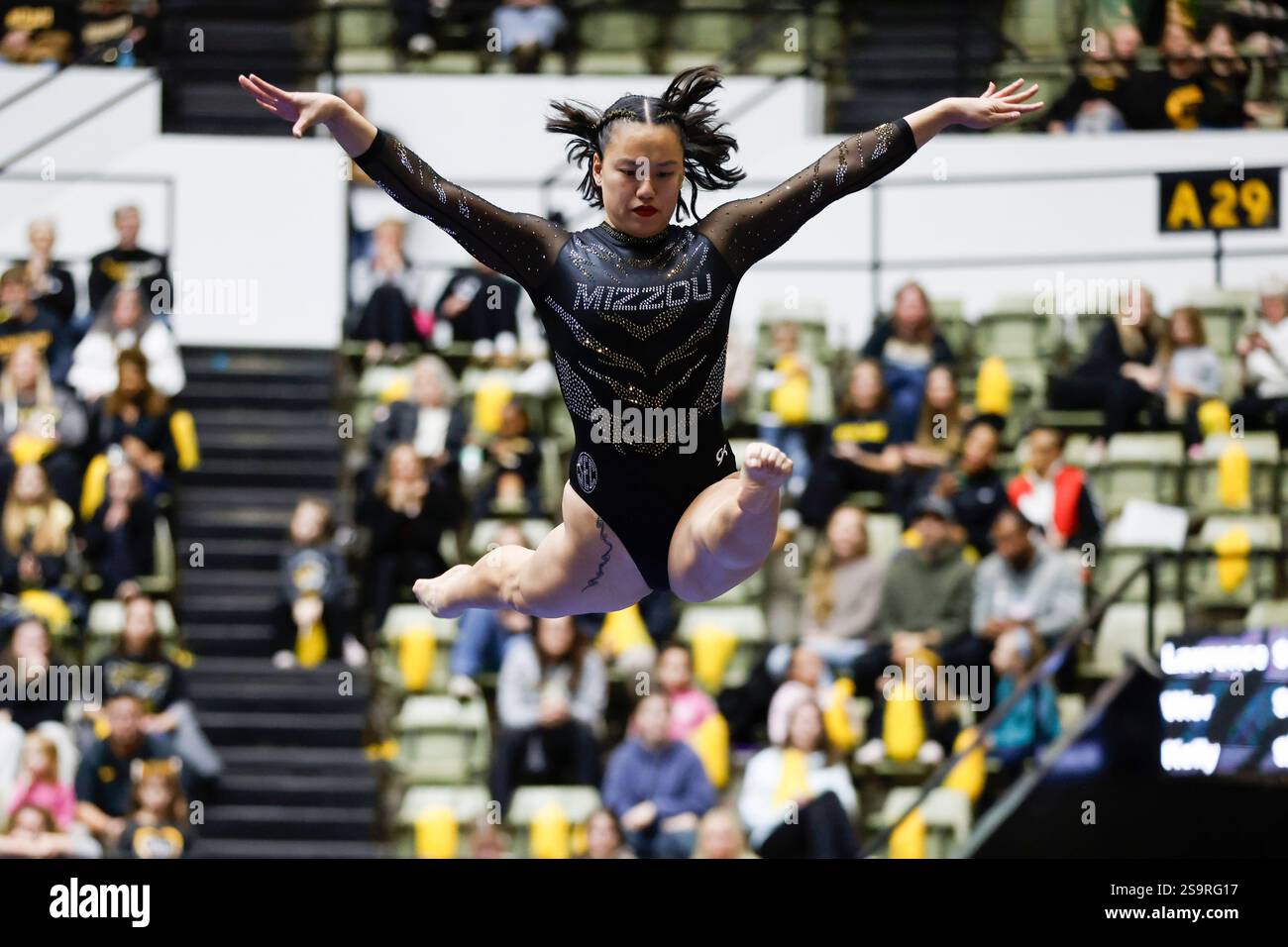 Missouri's Helen Hu competes on the balance beam during an NCAA college ...