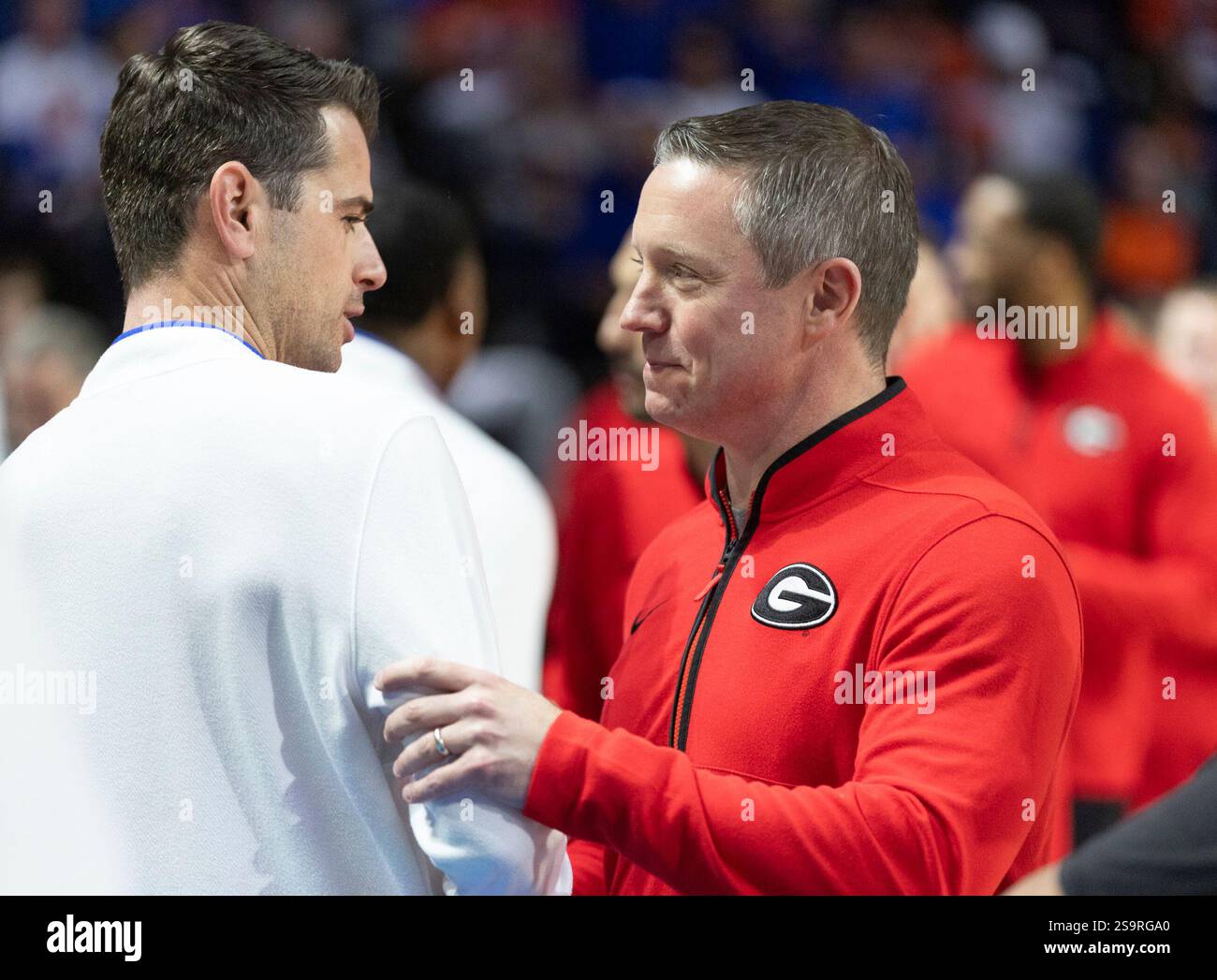 Florida head coach Todd Golden, left, and Georgia head coach Mike White ...