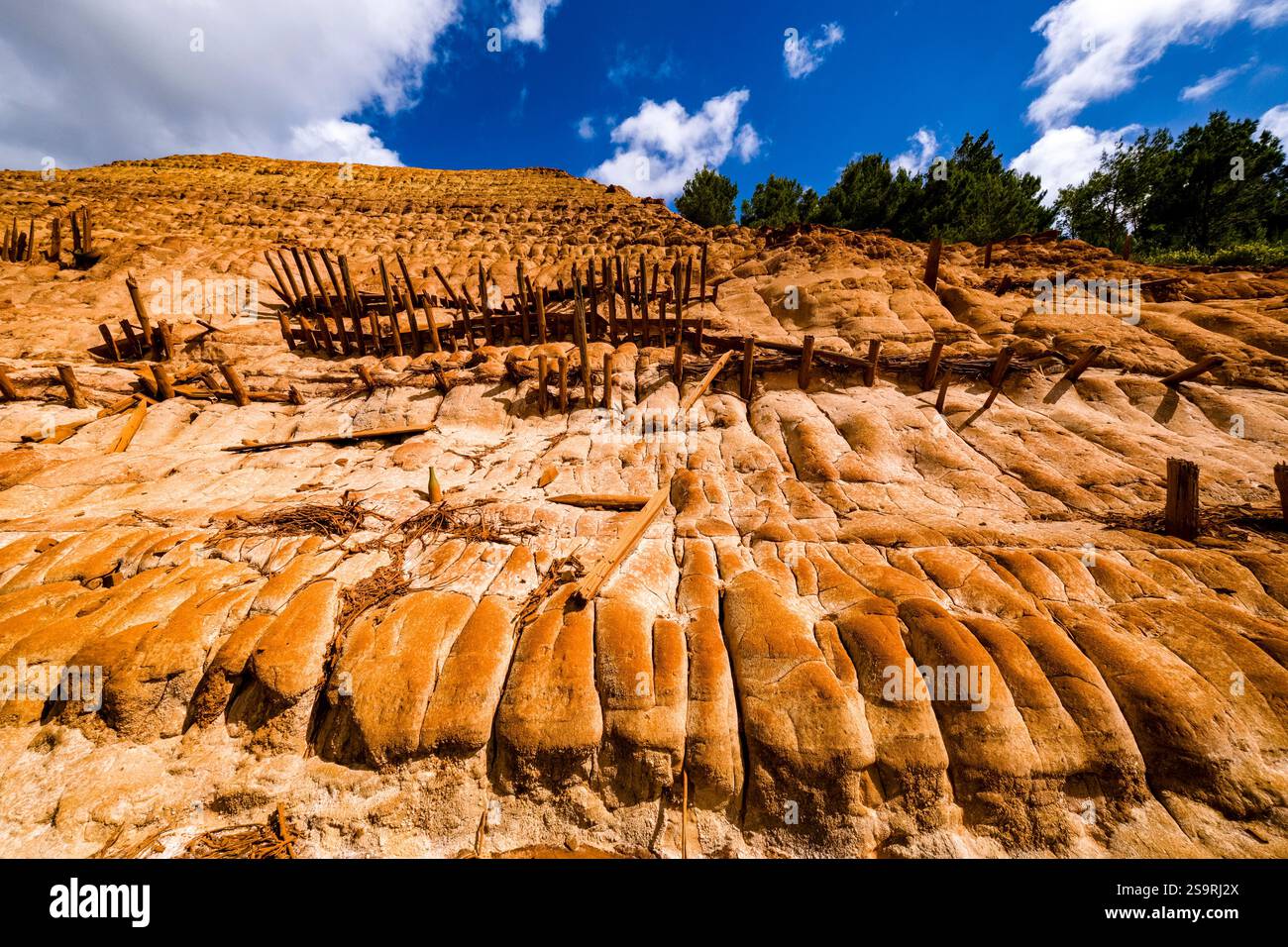 Orange-coloured spoil heaps of Monteponi, once one of the largest ...