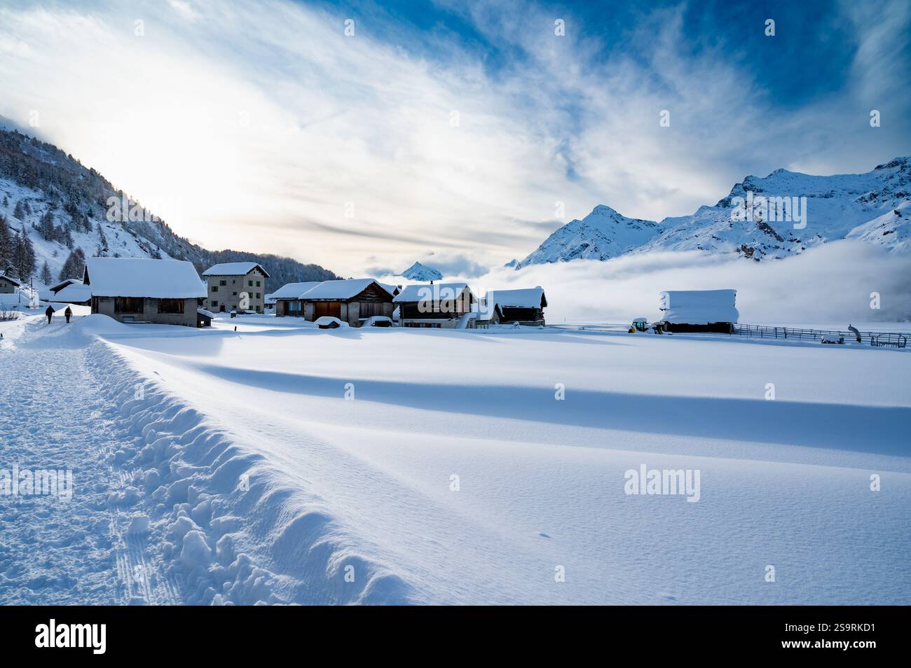 The village of Isola in winter, on Lake Sils, Engadin, Switzerland ...