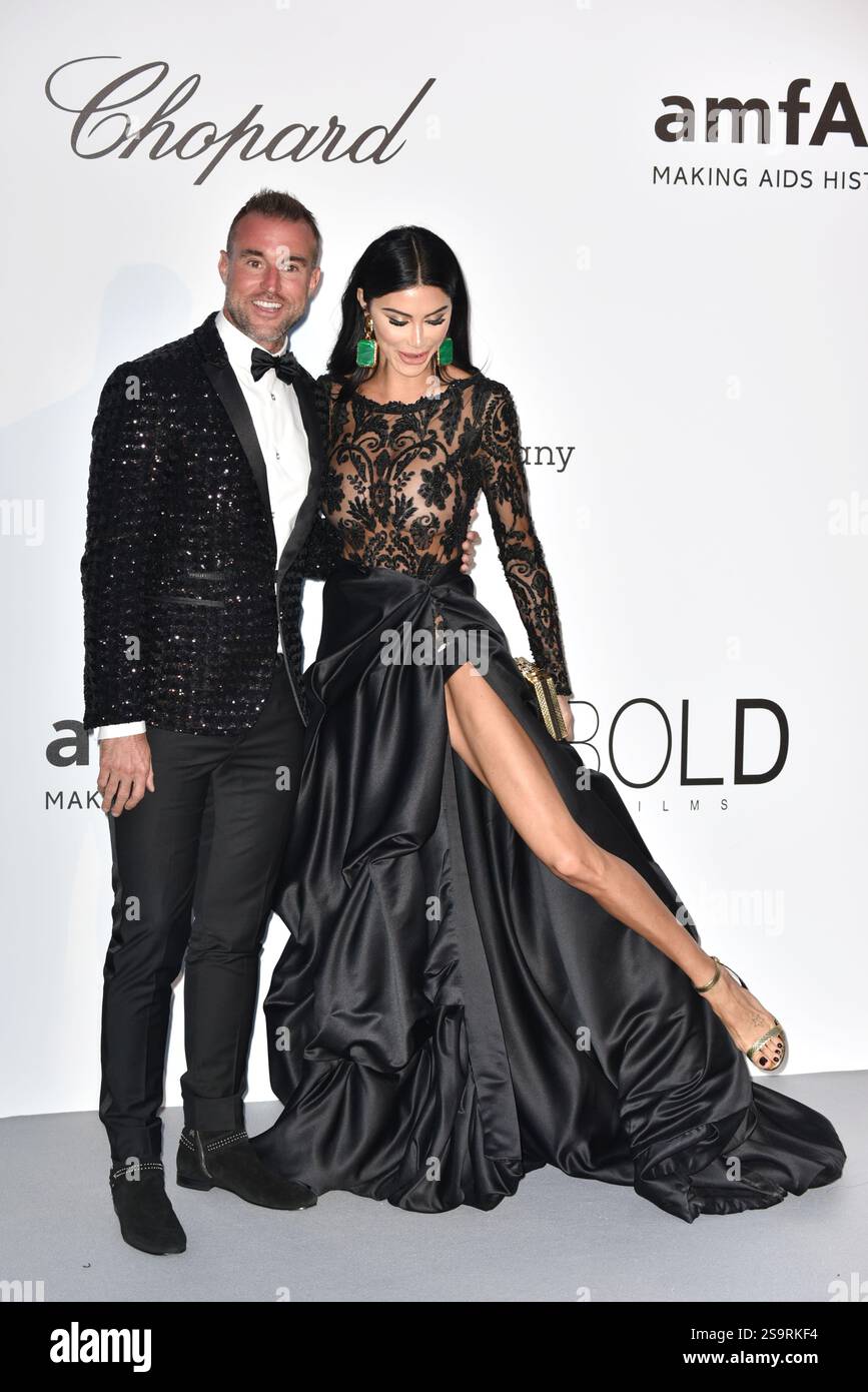 Phillip Plein and Morgan Osmanarrivals at 25th annual amfAR Gala at ...