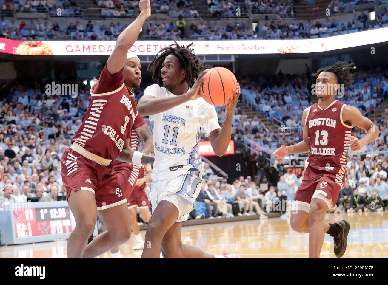 North Carolina guard Ian Jackson (11) drives against Boston College ...