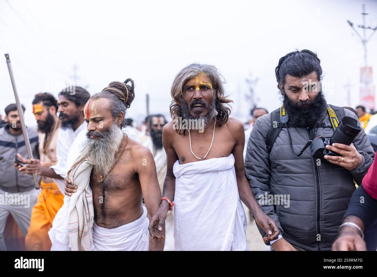 Mahakumbh, Group of holy sadhu and devotees marching towards the river ganga at sangam to take ...