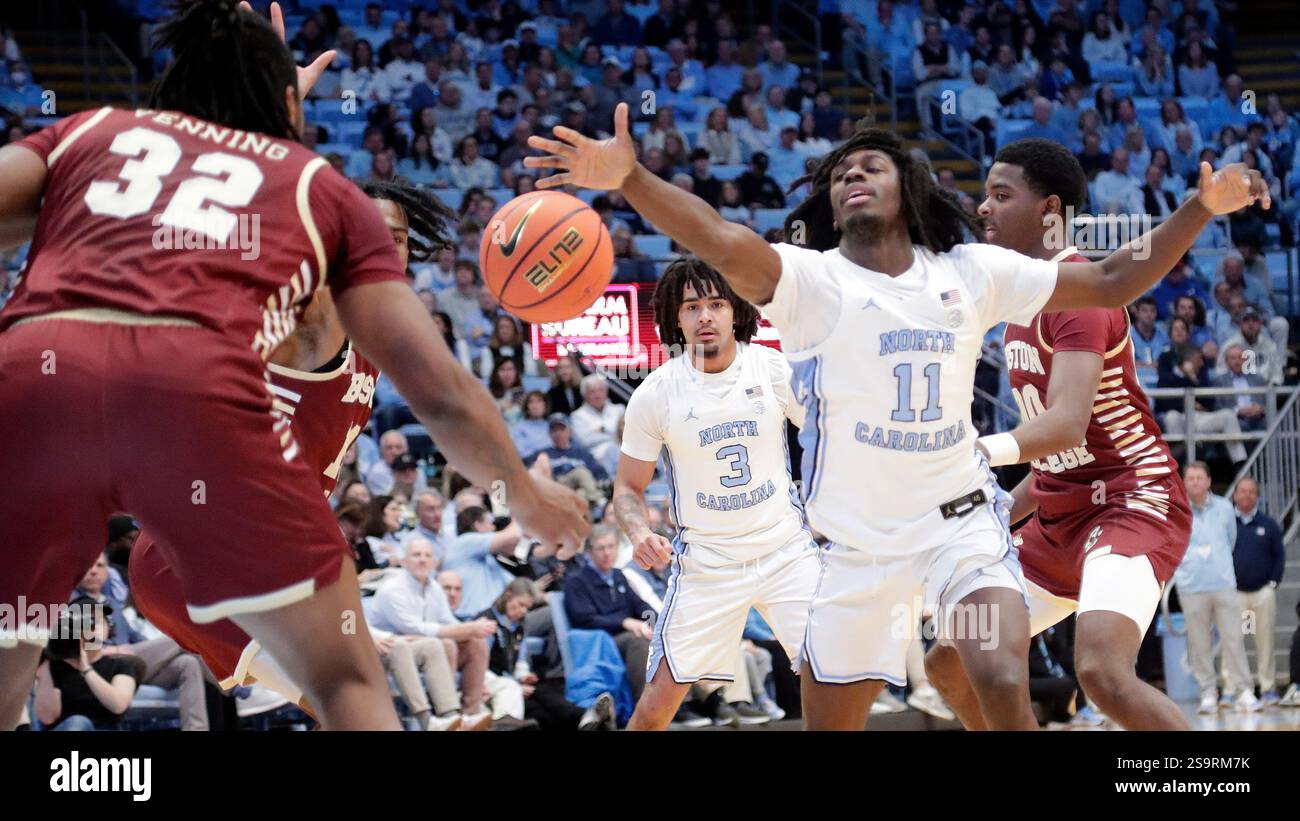 Boston College forward Chad Venning (32) and North Carolina guard Ian ...