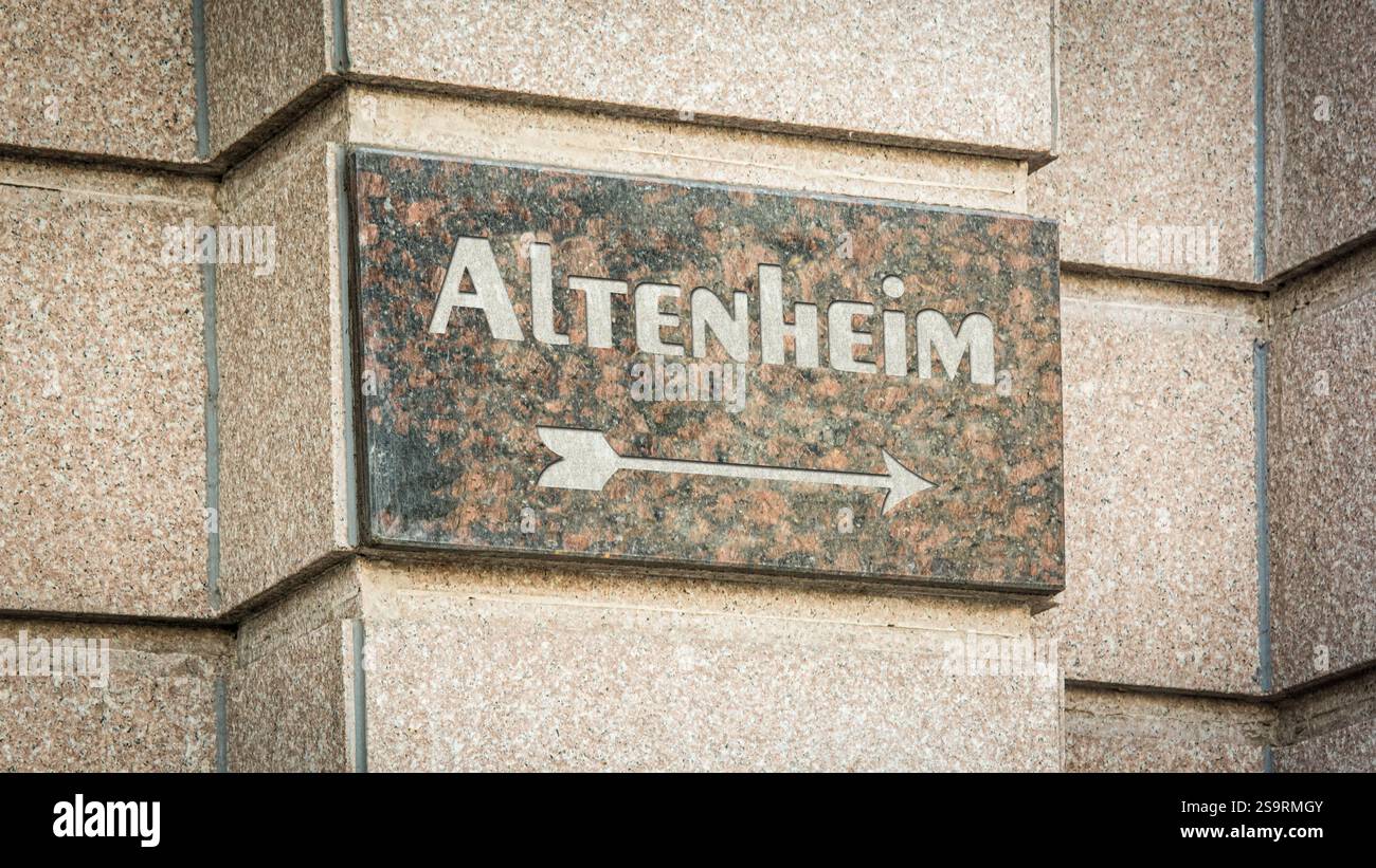 Image with a signpost and sign pointing in the direction of the nursing ...