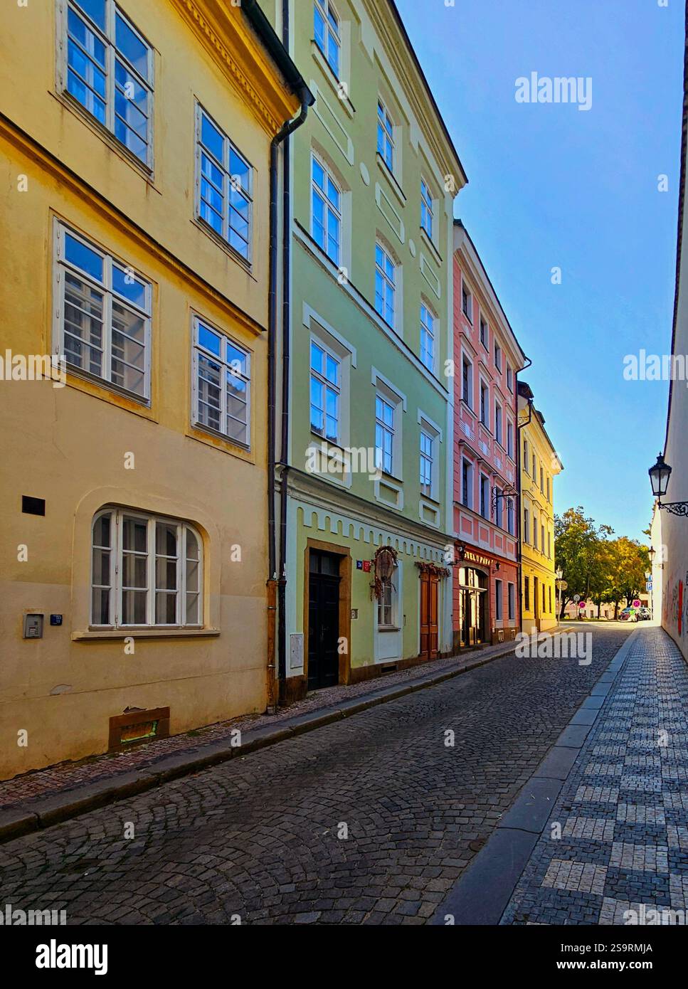 old, colorful buildings in an alley in Prague Stock Photo - Alamy