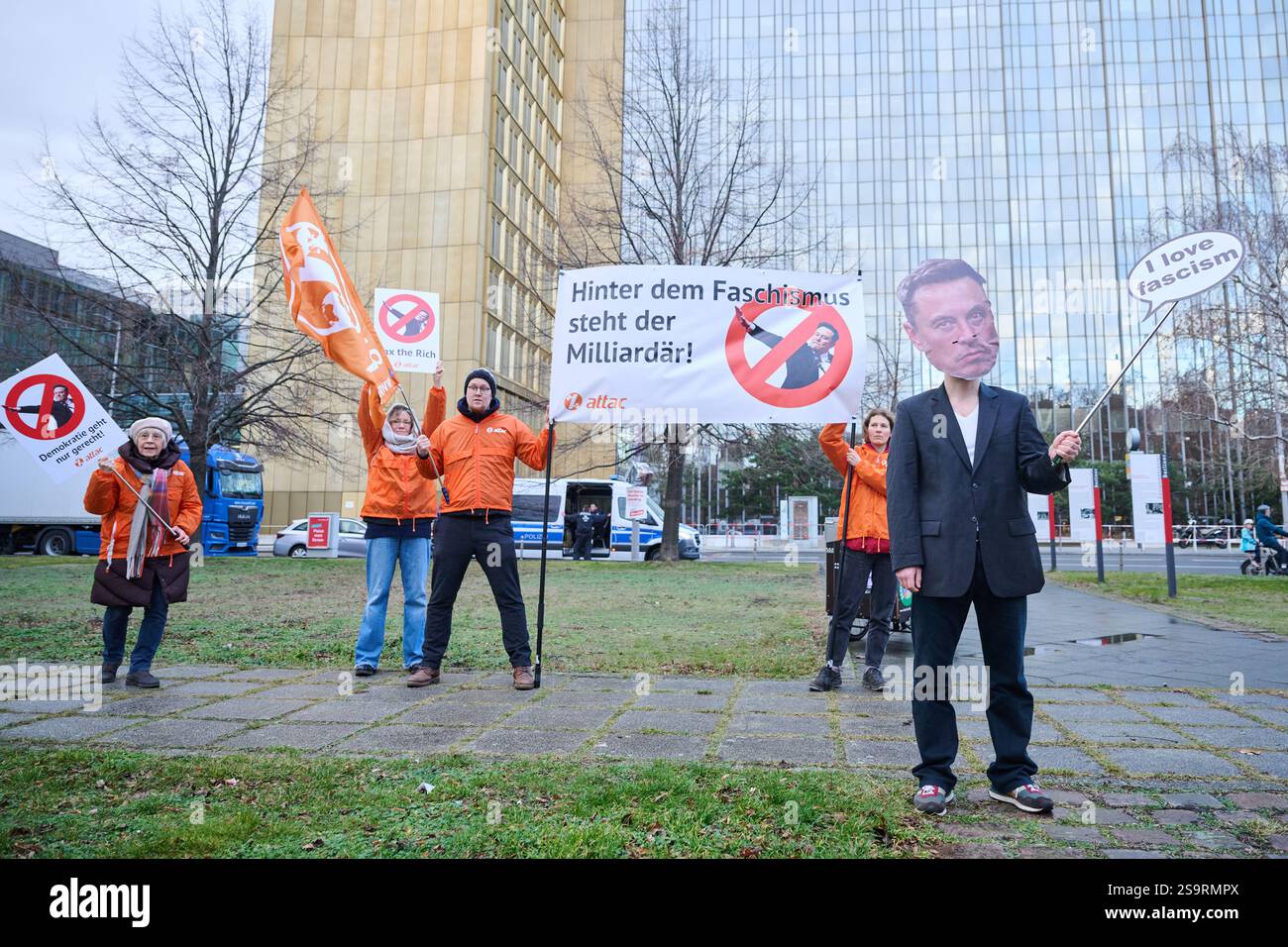 Berlin, Germany. 27th Jan, 2025. Attac activists stand in front of the ...