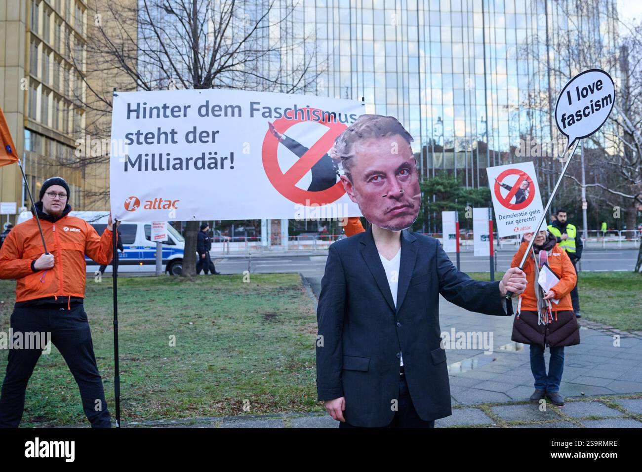 Berlin, Germany. 27th Jan, 2025. Activists from Attac stand in front of ...